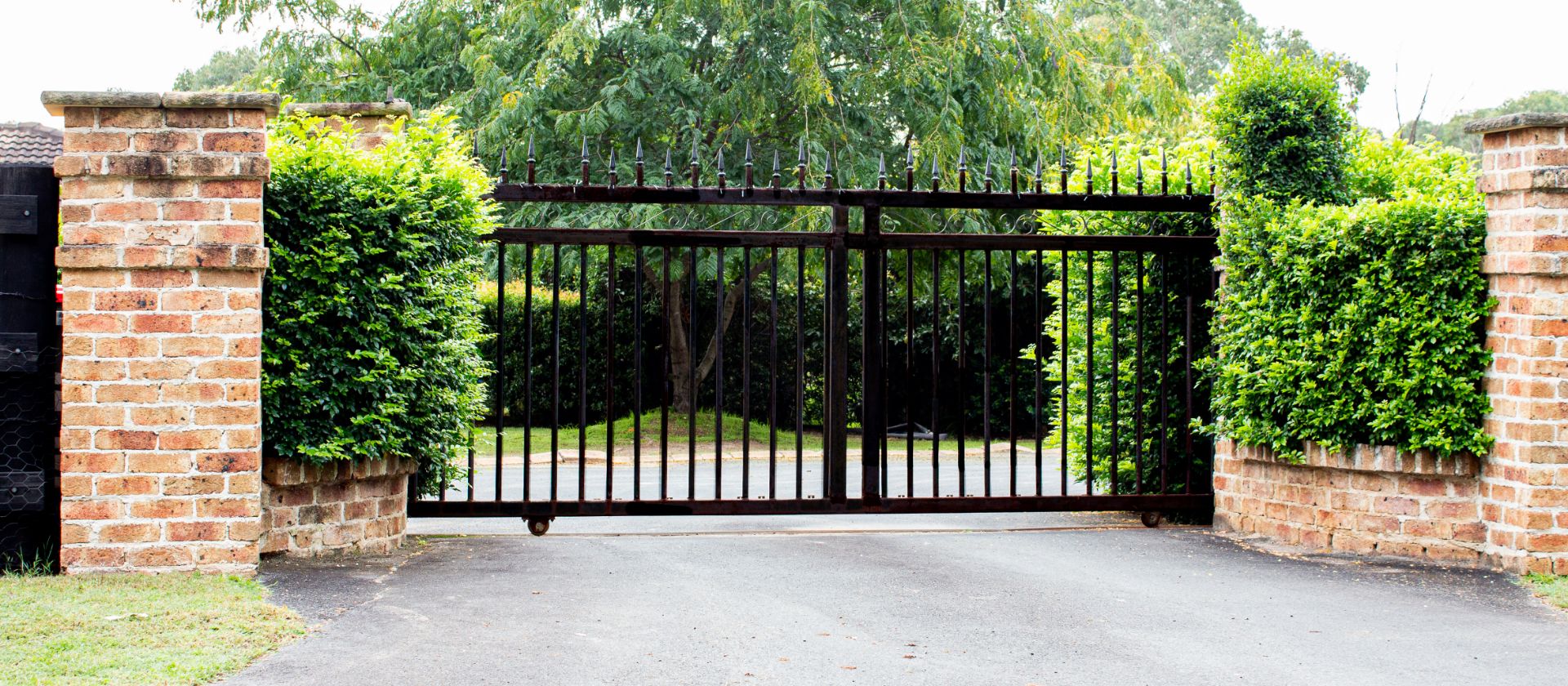 Metal Gate Installation - All Custom Paving